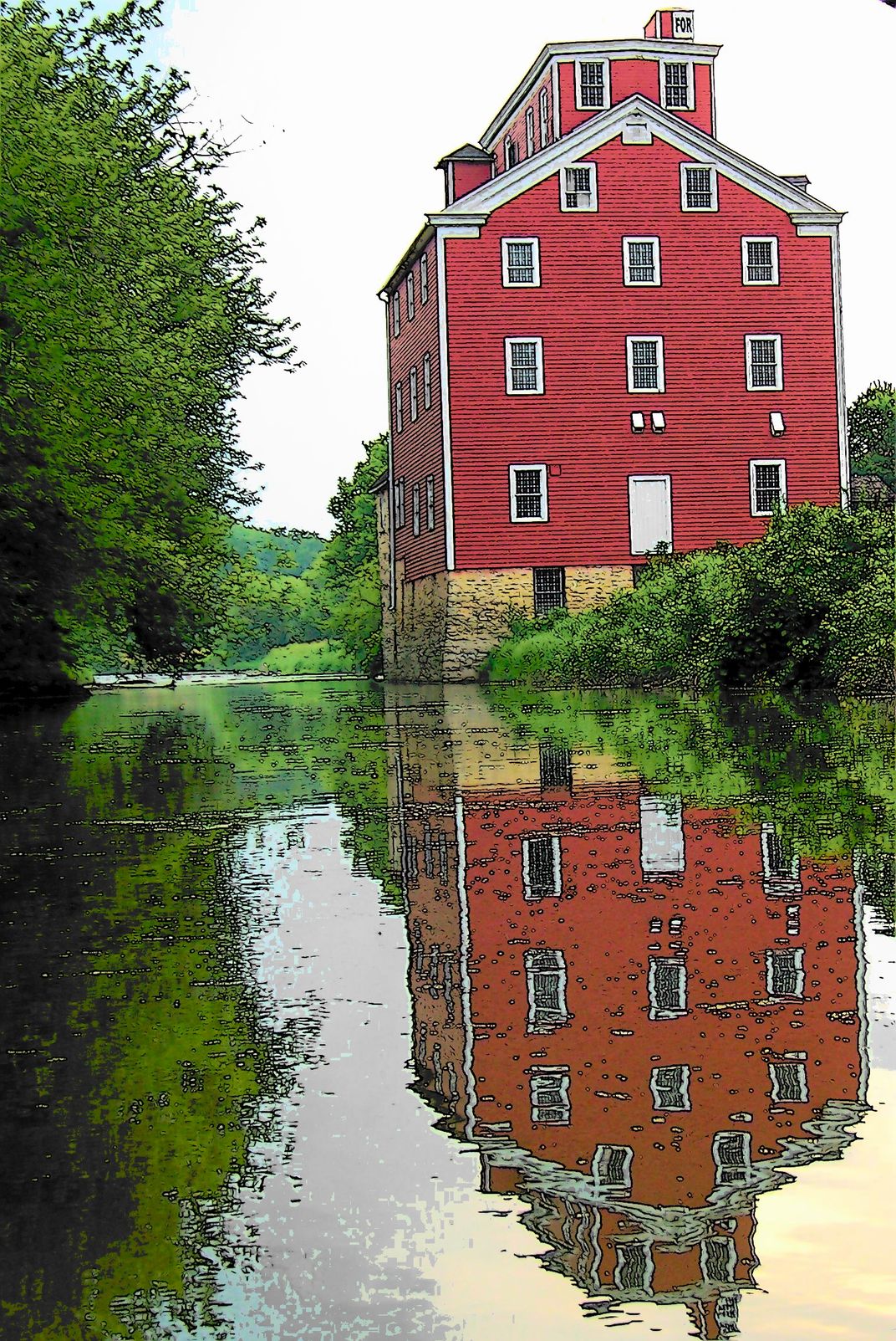 An old mill is reflected in the millrace pool outside Belleville, Ia ...