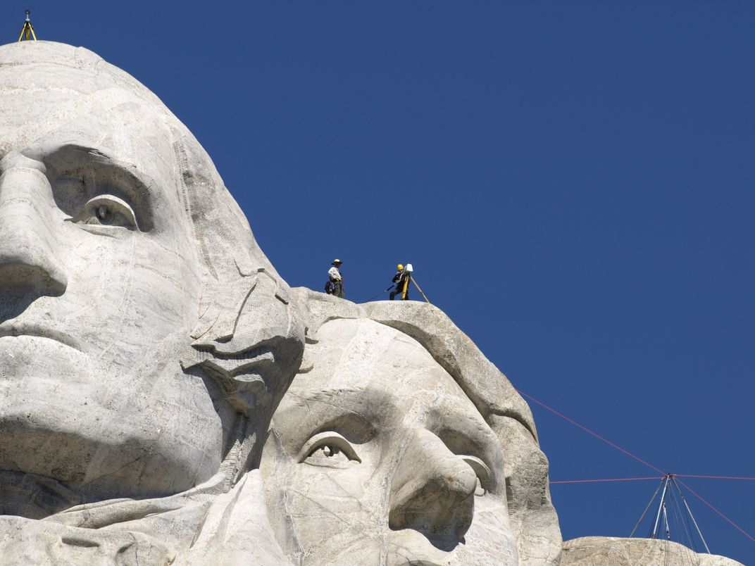 Surveyors on Mt Rushmore. We had no idea the little dots on top of the ...