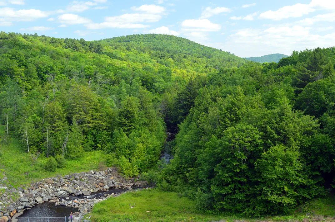 Fishing at the Clam River Dam. Two people fishing at the outfall of the ...