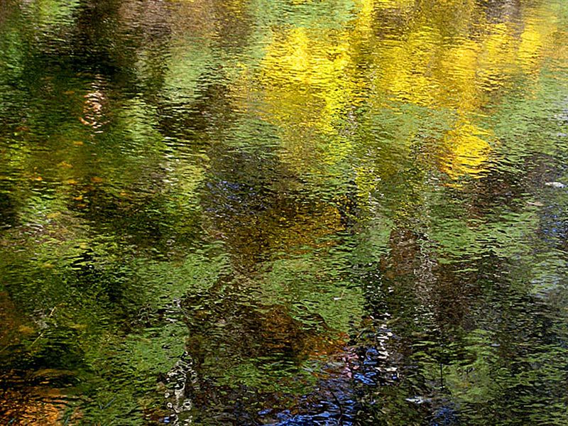 The Isinglass River in Strafford, NH, reflects the glory of a beautiful ...