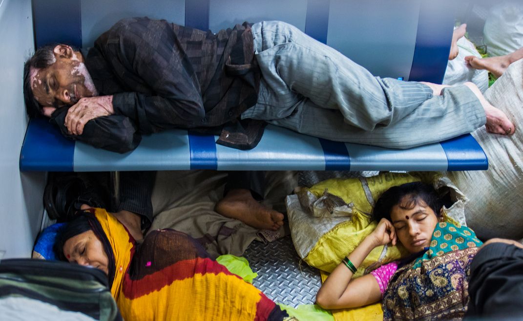 Vegetable vendors sleeping while commuting in the morning train ...