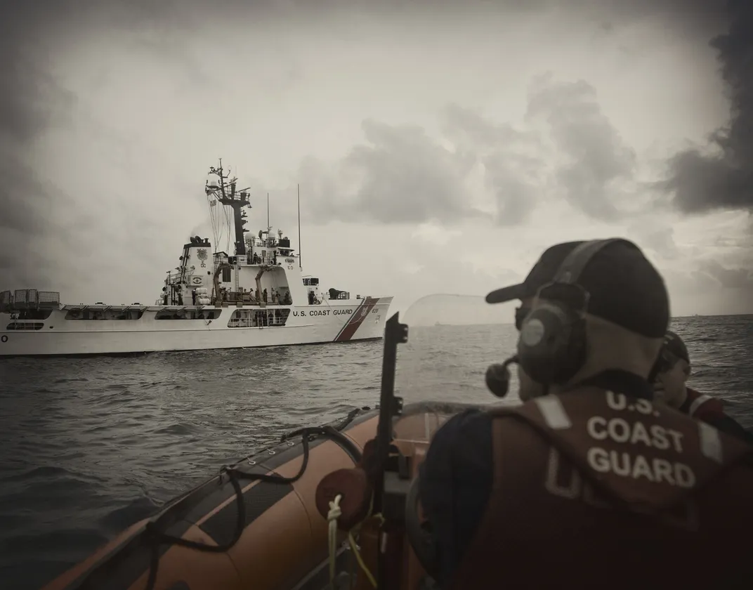 Heading back to the Coast Guard Cutter "Resolute" after circling the ...