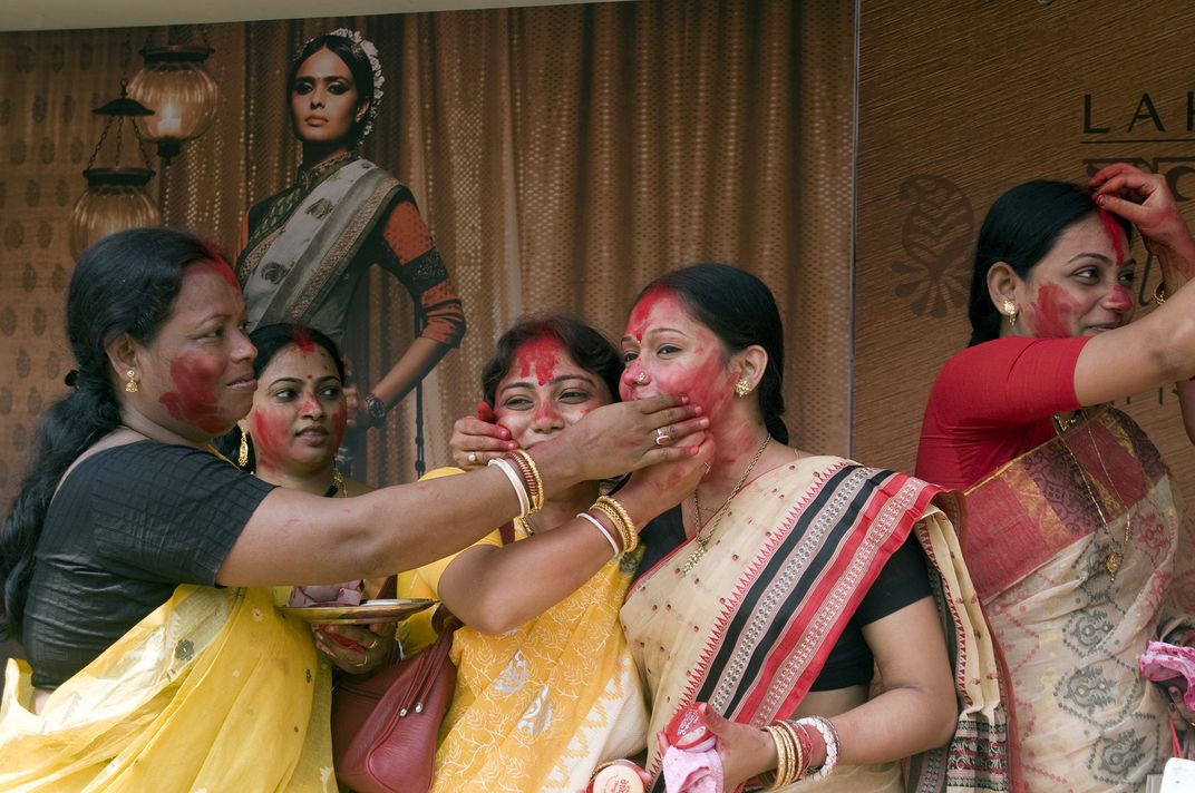 Hindu Women enjoying shidur(vermilion)celebration during Durga Puja ...