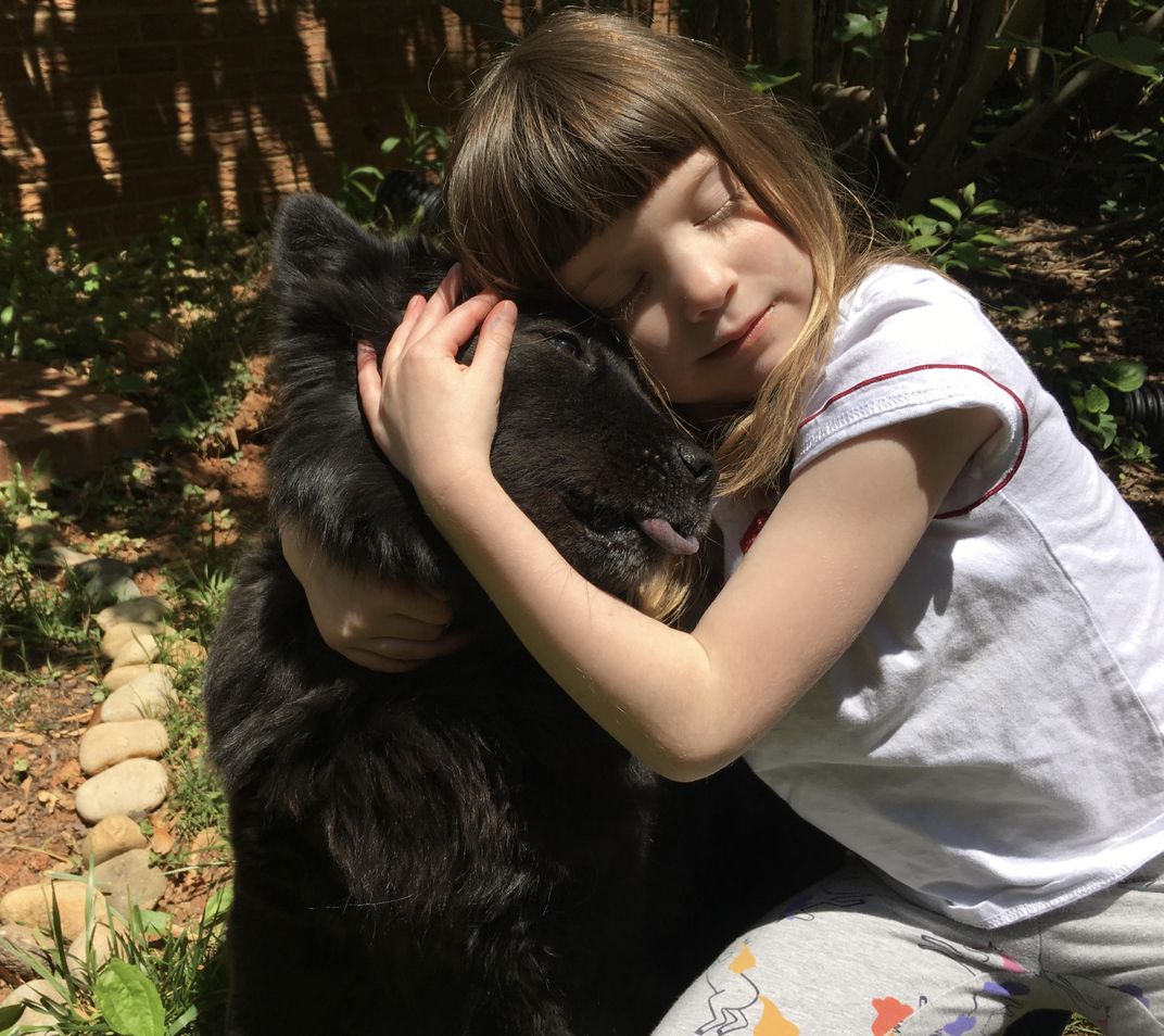 A girl and her dog | Smithsonian Photo Contest | Smithsonian Magazine