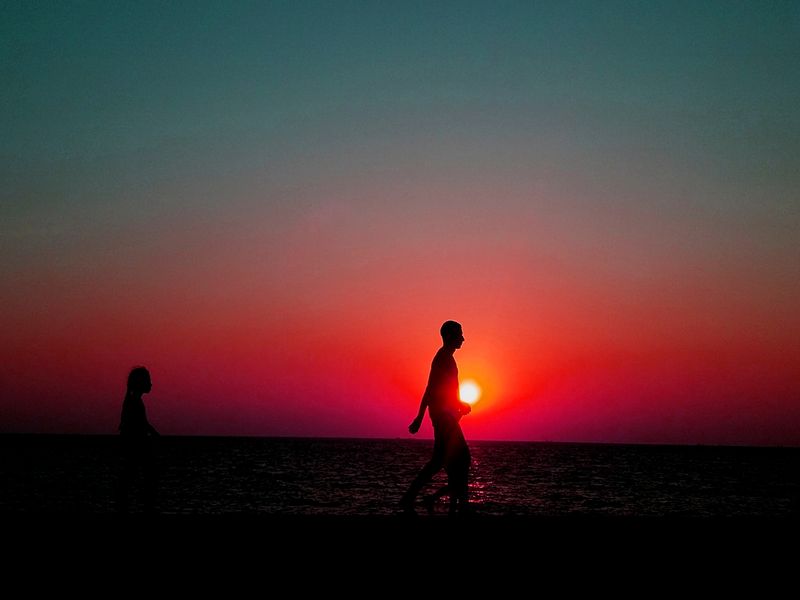 hugging the sun | Smithsonian Photo Contest | Smithsonian Magazine