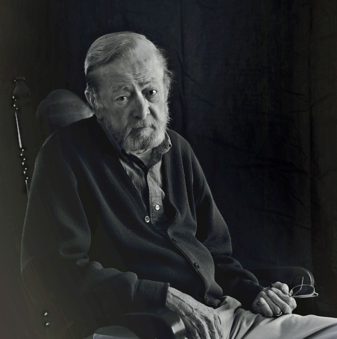 Joseph Griffith sitting next to his living room window. This photograph ...