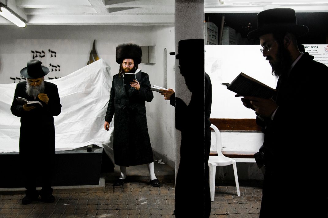 Haredim (ultra-Orthodox jews) carry a prayer. | Smithsonian Photo ...