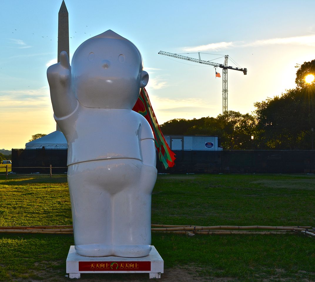 Large male statue at 2014 Smithsonian Folklife Festival on The National ...