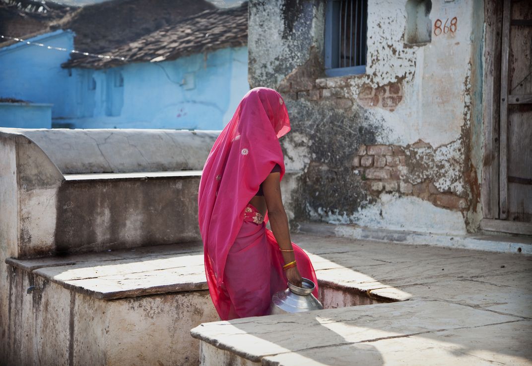 Woman gathering water, Alipura, India | Smithsonian Photo Contest ...
