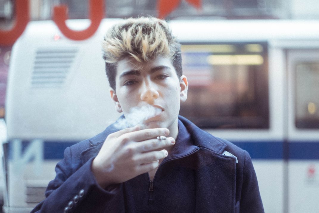 boy smoking | Smithsonian Photo Contest | Smithsonian Magazine