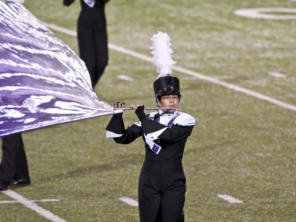 The Magic Flute - a flutist from Cedar Ridge marching band performs ...