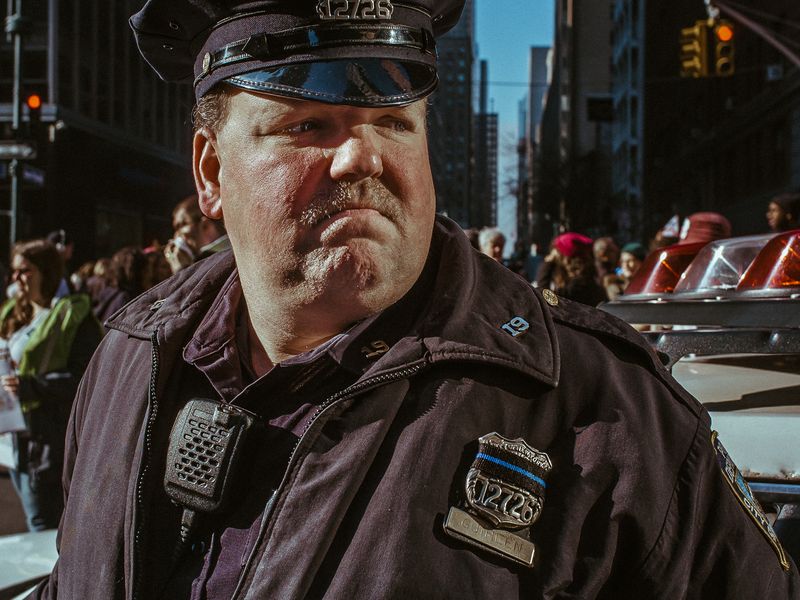 A police officer stays alert during the 2017 Women's March in NYC ...