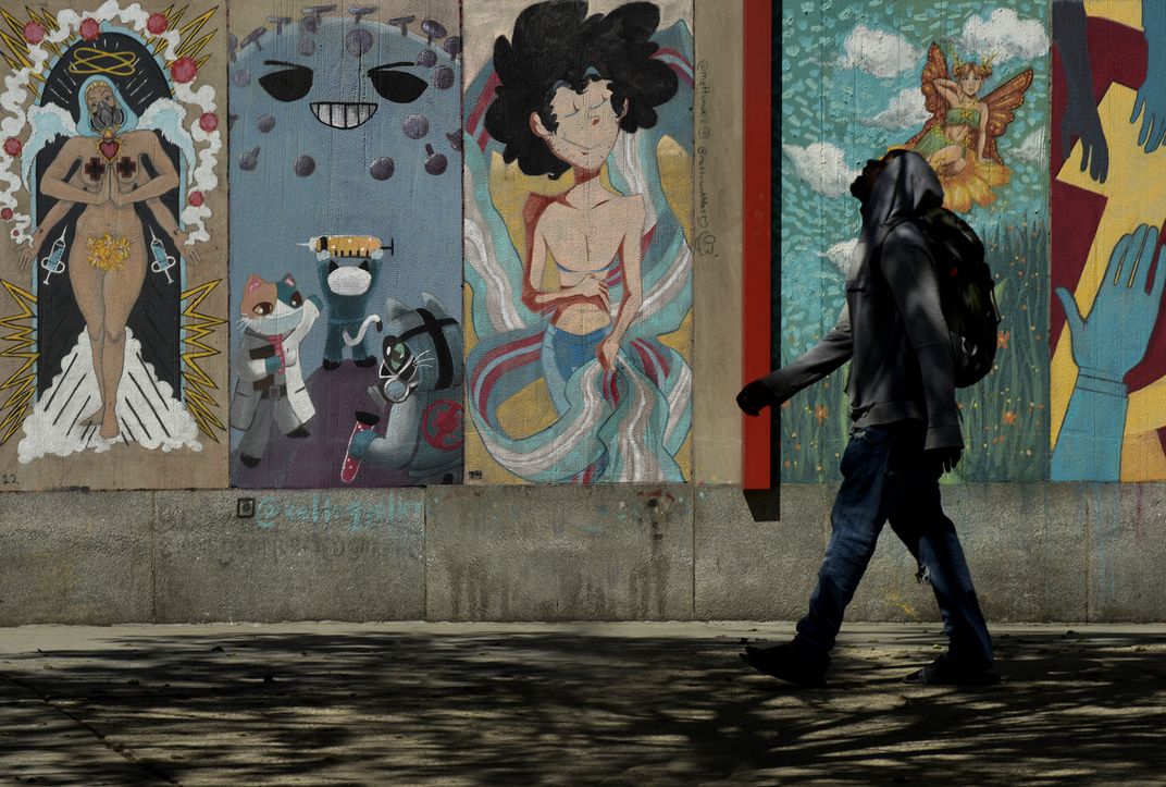 Man Walking Past Graffiti | Smithsonian Photo Contest | Smithsonian ...