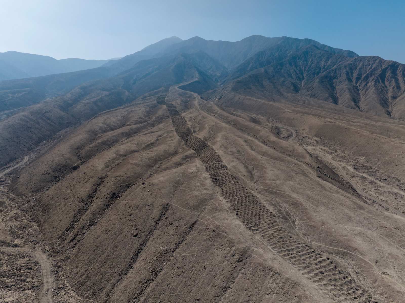 Thousands of Mysterious Holes Dot the Landscape in Peru. Archaeologists ...