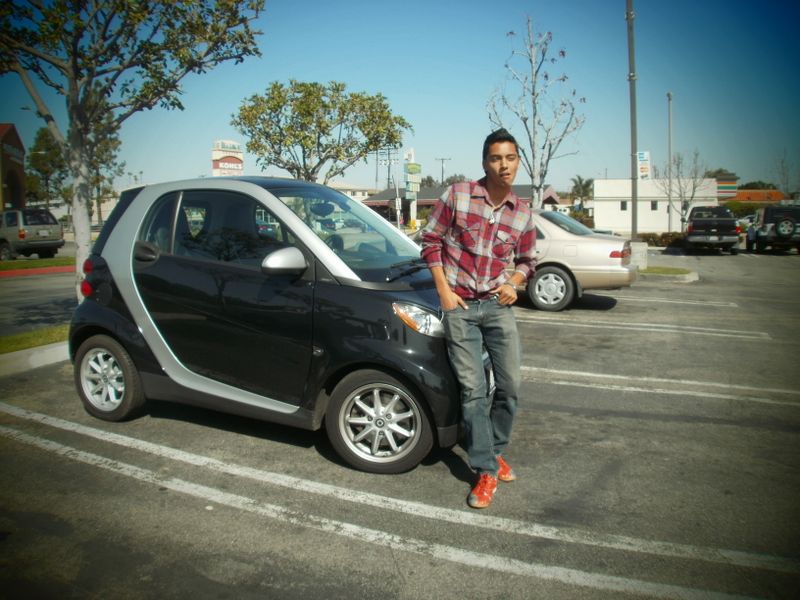 little car big guy | Smithsonian Photo Contest | Smithsonian Magazine