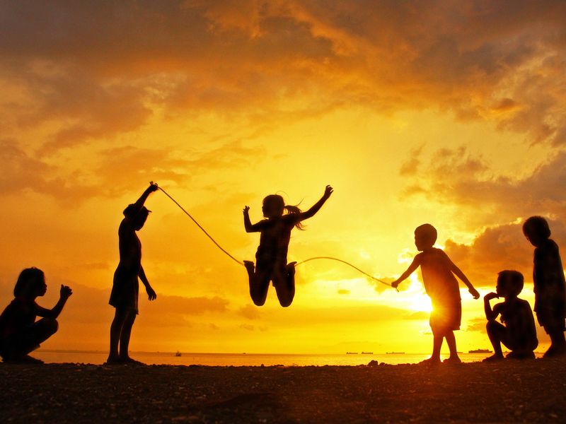 Kids Playing Of Jumping Rope During Summer Time | Smithsonian Photo ...