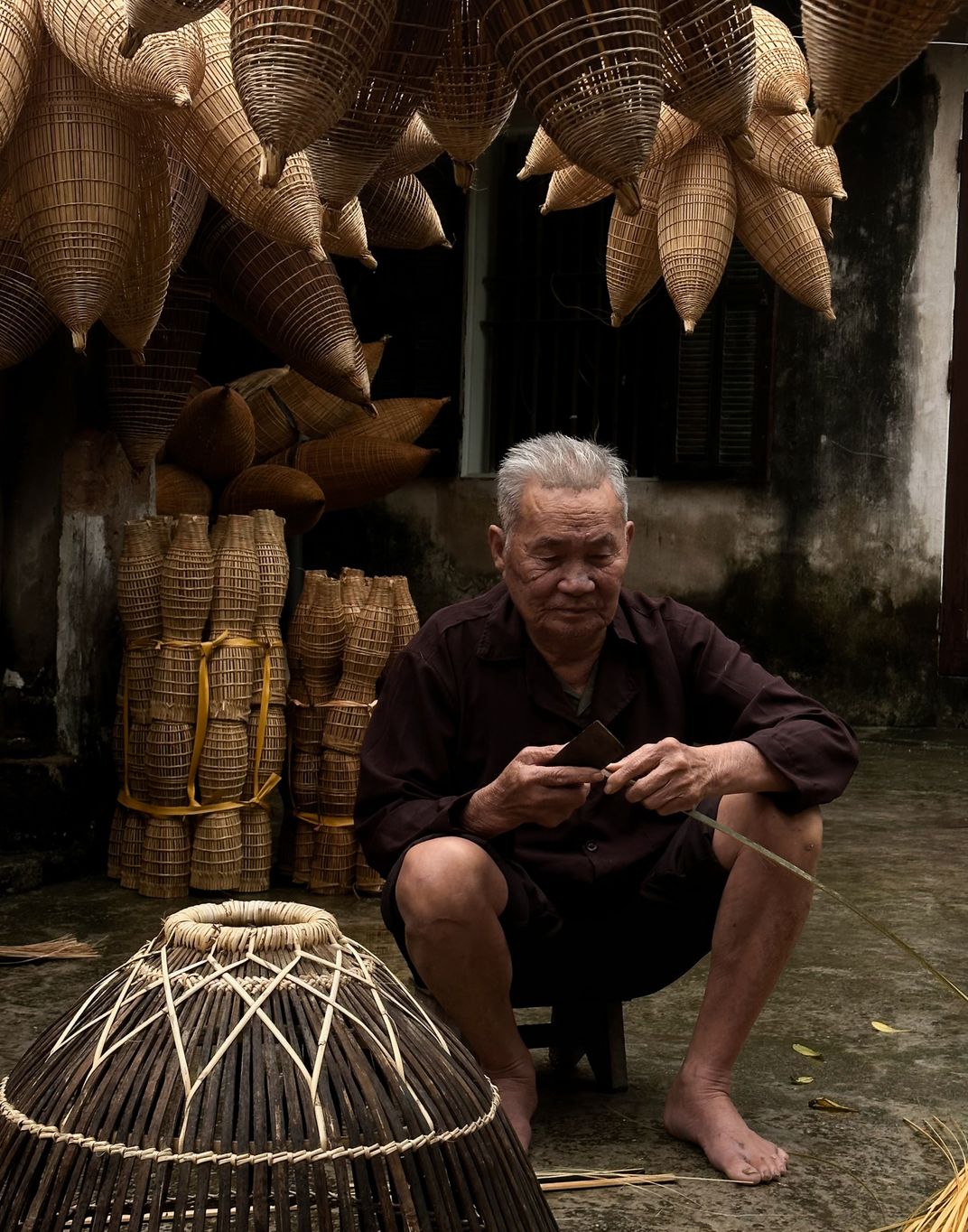 Vietnamese bamboo fish trap basket weaver | Smithsonian Photo Contest ...