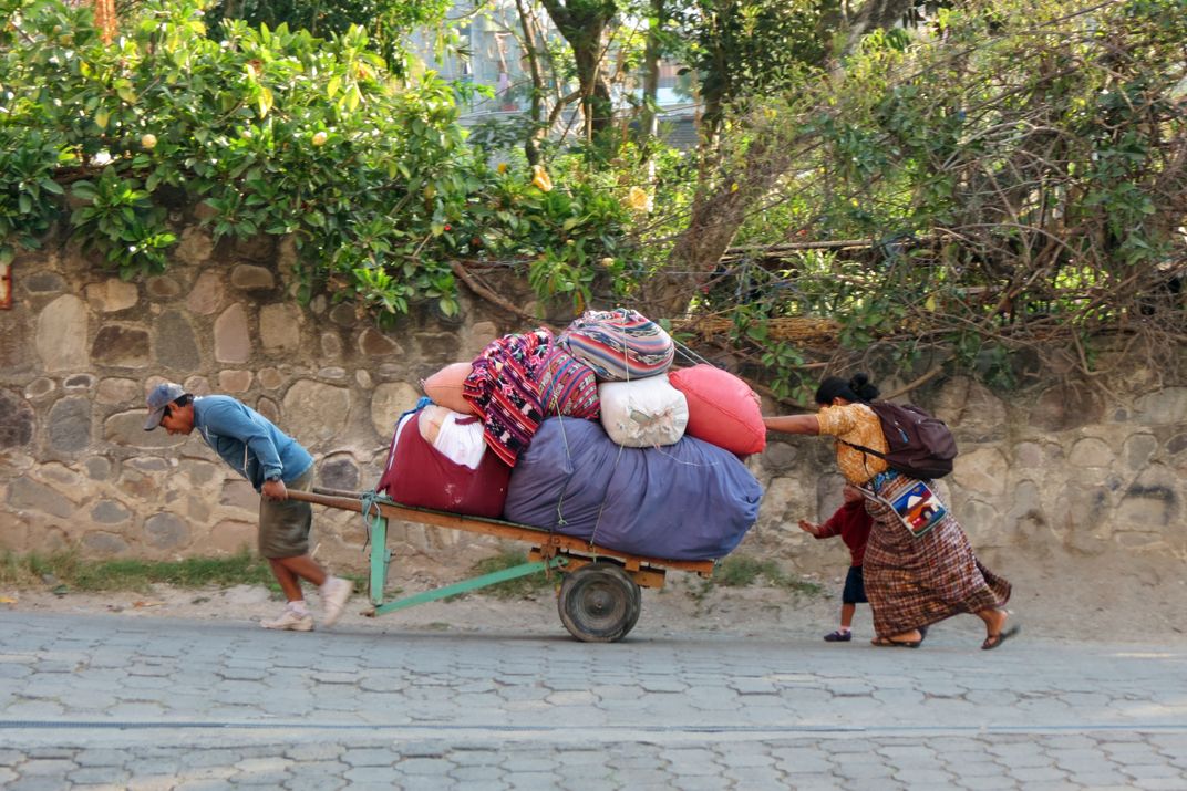 Family moving a heavy load | Smithsonian Photo Contest | Smithsonian ...
