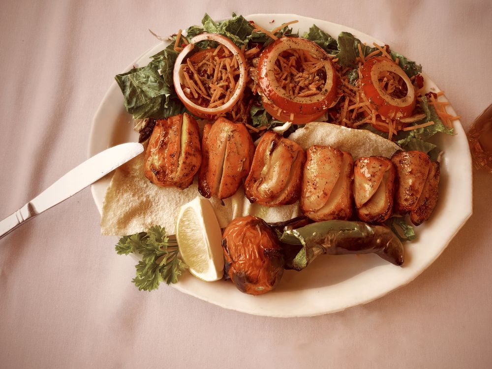 middle eastern-style grilled chicken kabob plate local restaurant ...