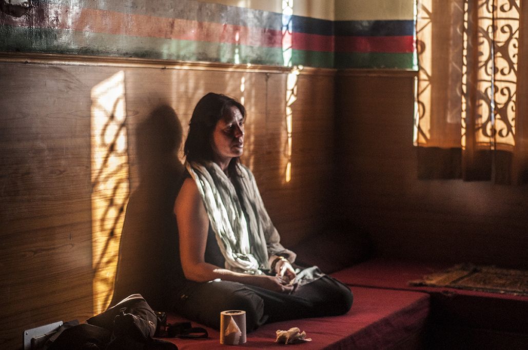 German woman praying at Ki Monestary Spiti Valley Himalayas (Himachal ...
