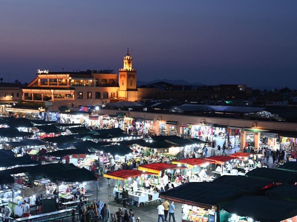 A lively nighttime outdoor market in Marrakesh, Morocco | Smithsonian ...