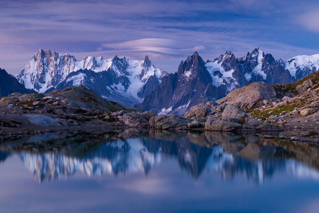 Early morning at Lac Blanc, Alps, France. View at the Mont Blanc ridge ...
