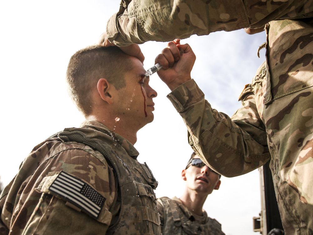 Care Under Fire | Smithsonian Photo Contest | Smithsonian Magazine