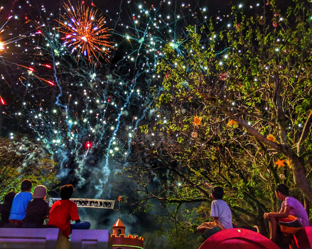 Kids gazing the sky as the fireworks light up the night. | Smithsonian ...