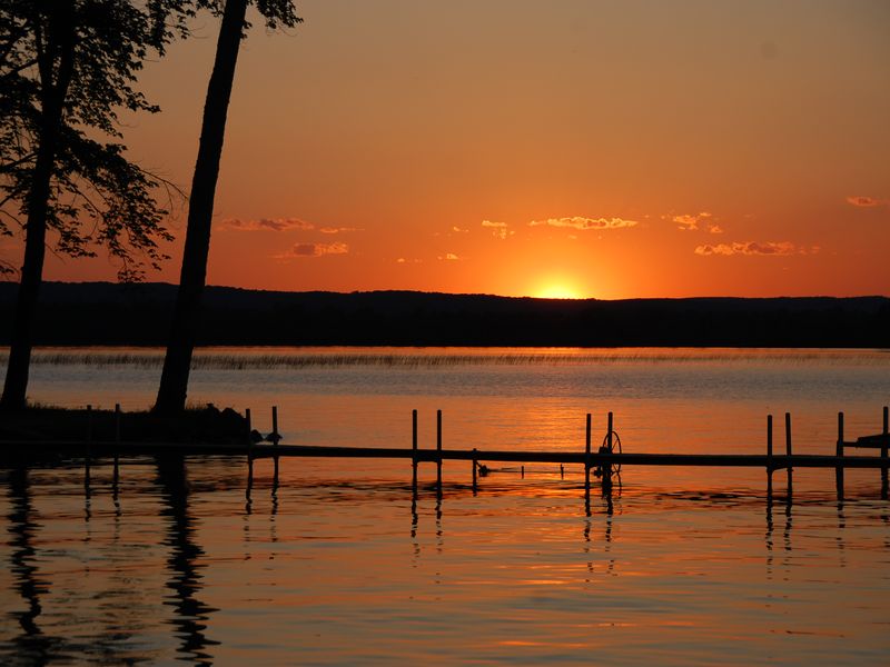 Sunset while vacationing on Burt Lake in Michigan. | Smithsonian Photo ...
