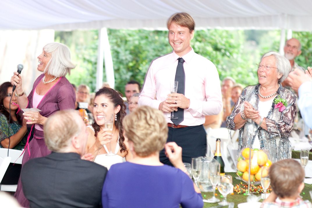 People celebrate and enjoy themselves at a wedding reception ...