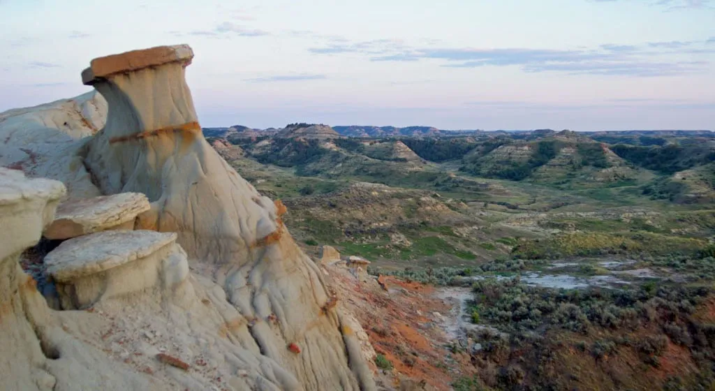 A Scenic Road Winding Through Theodore Roosevelt National Park Finally ...