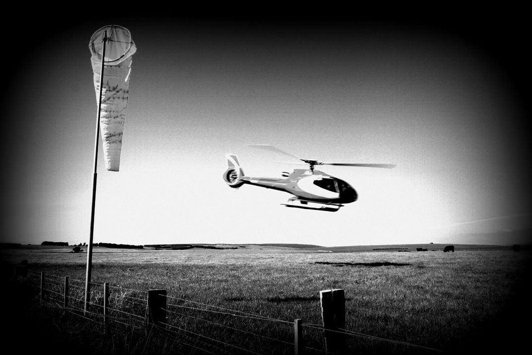 Chopper taking off over a cattle farm. | Smithsonian Photo Contest ...