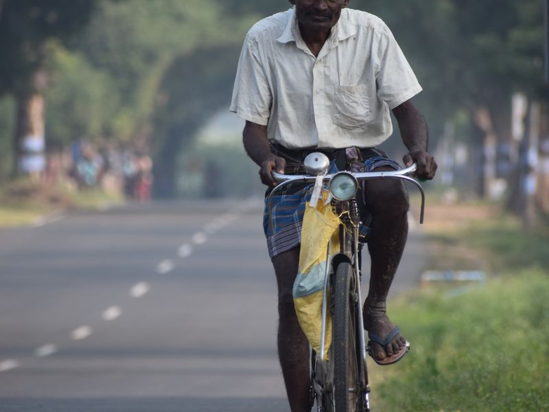 Village Cycle Rider | Smithsonian Photo Contest | Smithsonian Magazine