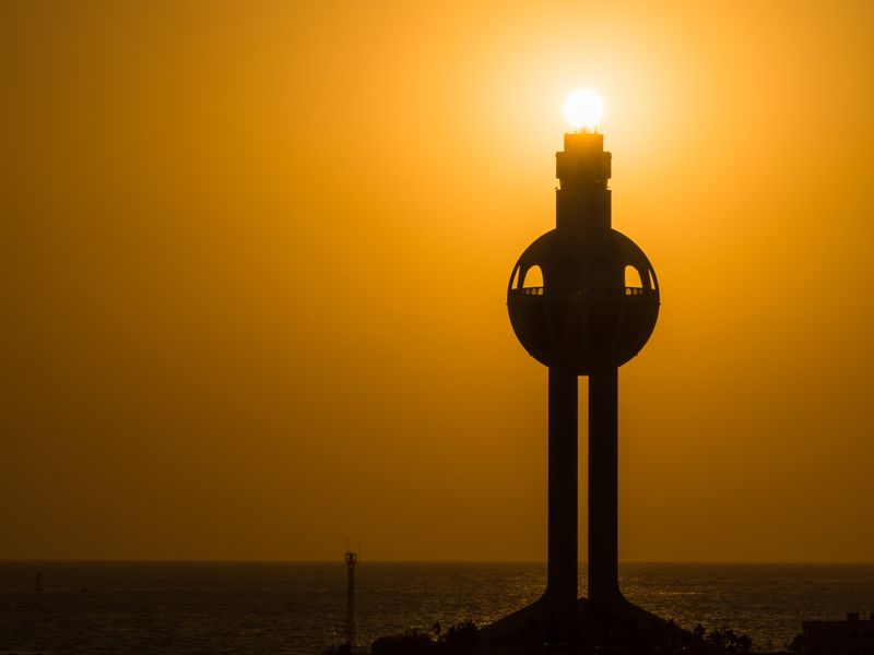 The sun sets behind Port Jeddah Lighthouse | Smithsonian Photo Contest ...
