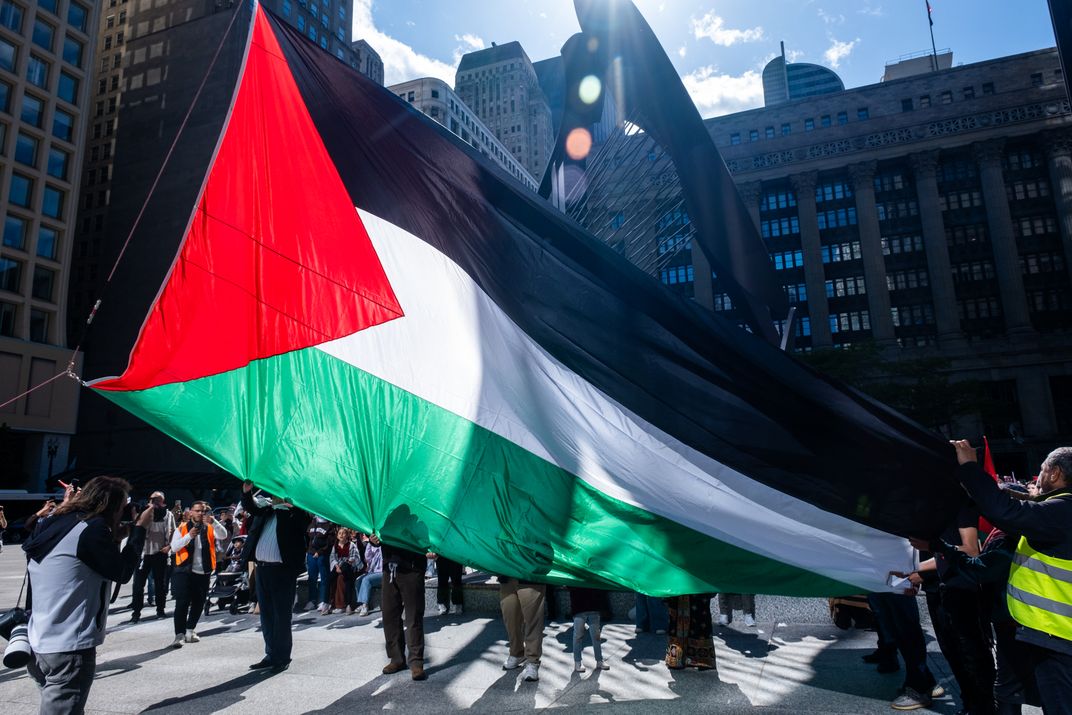 The raising of the Palestinian flag | Smithsonian Photo Contest ...