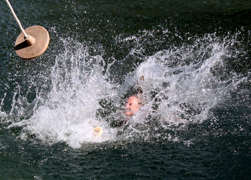 A girl falling off of rope into a pond. | Smithsonian Photo Contest ...