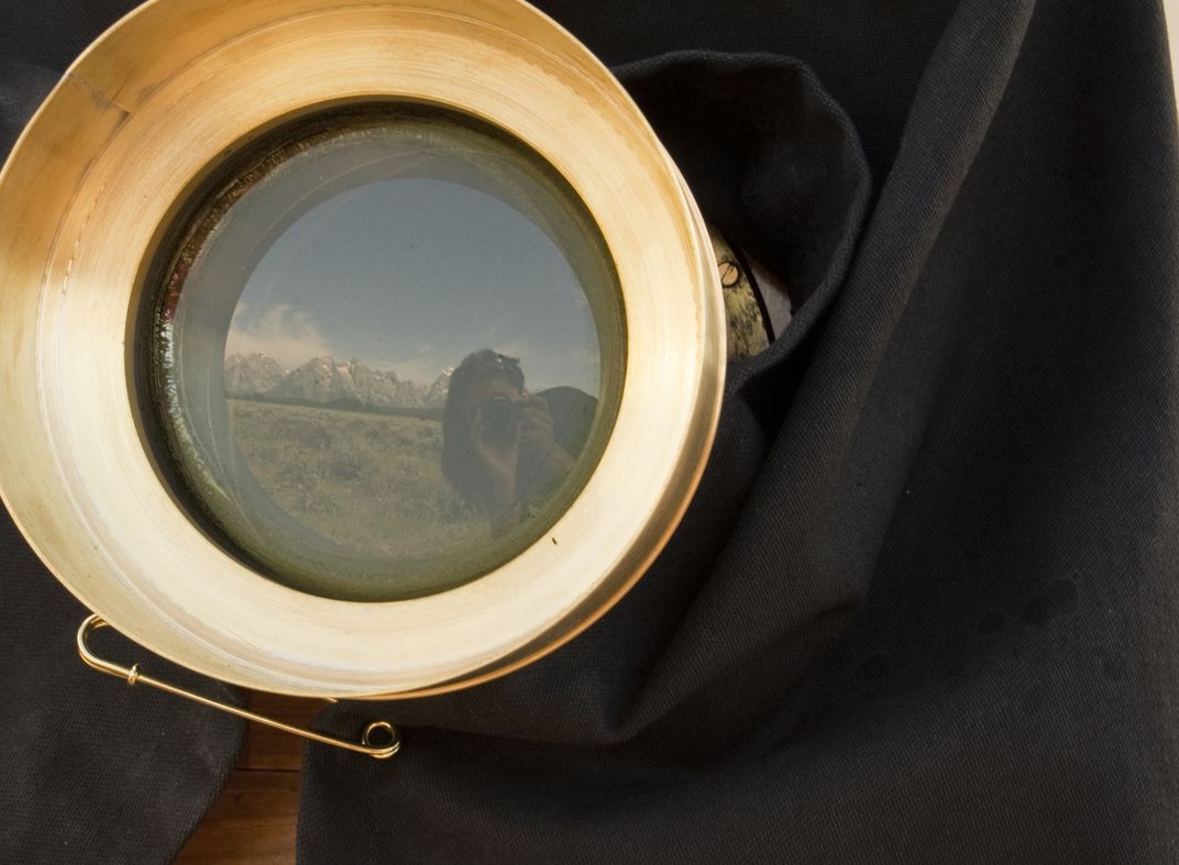 Reflection in the lens of a refurbished camera | Smithsonian Photo ...