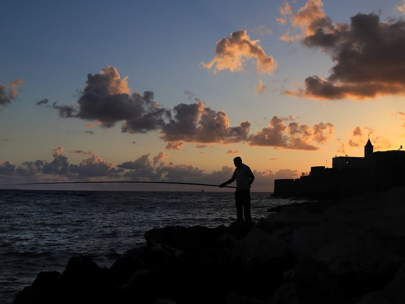 Fishing At Sunset | Smithsonian Photo Contest | Smithsonian Magazine