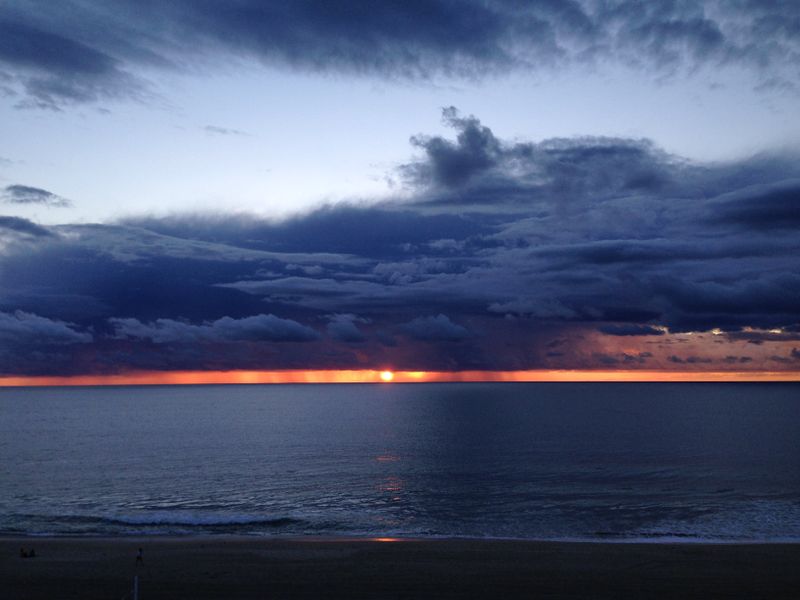 Storm clouds during a beach sunset | Smithsonian Photo Contest ...
