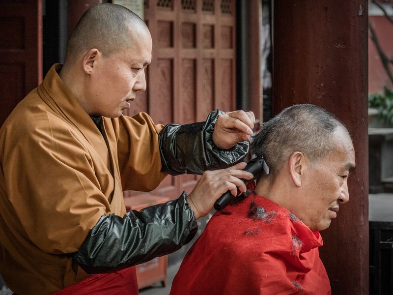Monk Cutting Hair | Smithsonian Photo Contest | Smithsonian Magazine