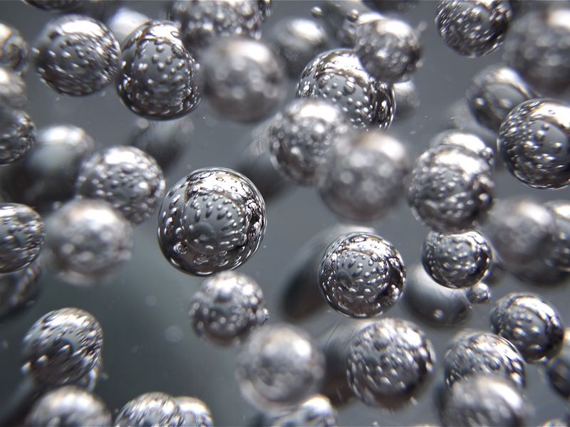 Air bubbles trapped inside a solid glass sphere. | Smithsonian Photo ...