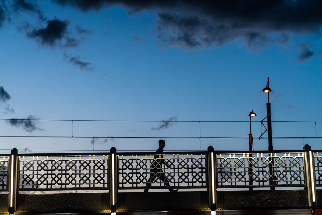 Man on the bridge | Smithsonian Photo Contest | Smithsonian Magazine
