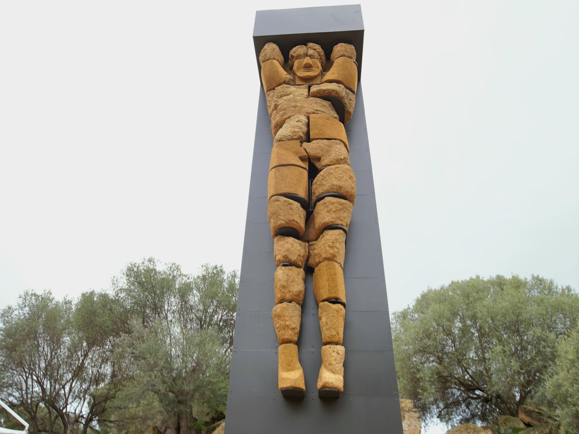 A Towering Statue of Atlas Emerges From the Ruins of Sicily's Ancient ...