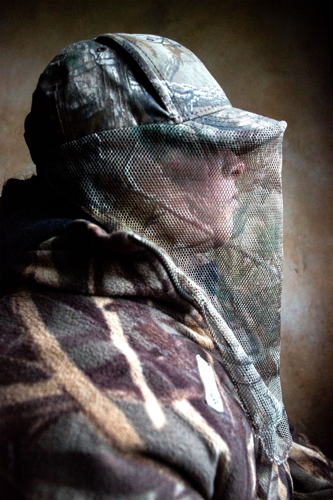 A hunter waiting inside a deer stand. | Smithsonian Photo Contest ...