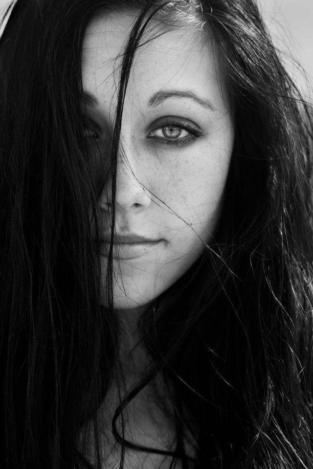A young woman makes eye contact with the camera lens in the Colorado ...