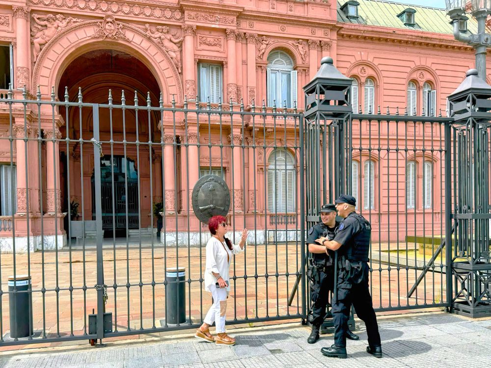A playful conversation with federal police officers in front of the ...