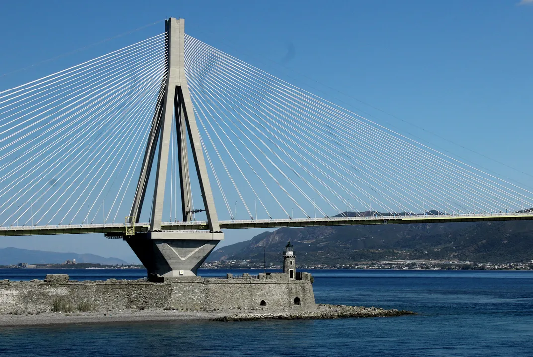 old lighthouse under mega bridge | Smithsonian Photo Contest ...