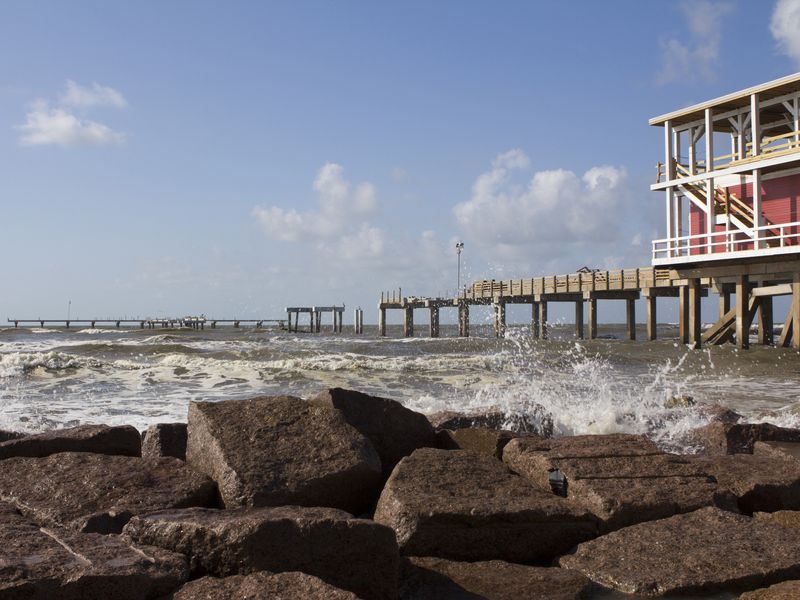 Waves break against the shoreline at Galveston, Texas | Smithsonian ...