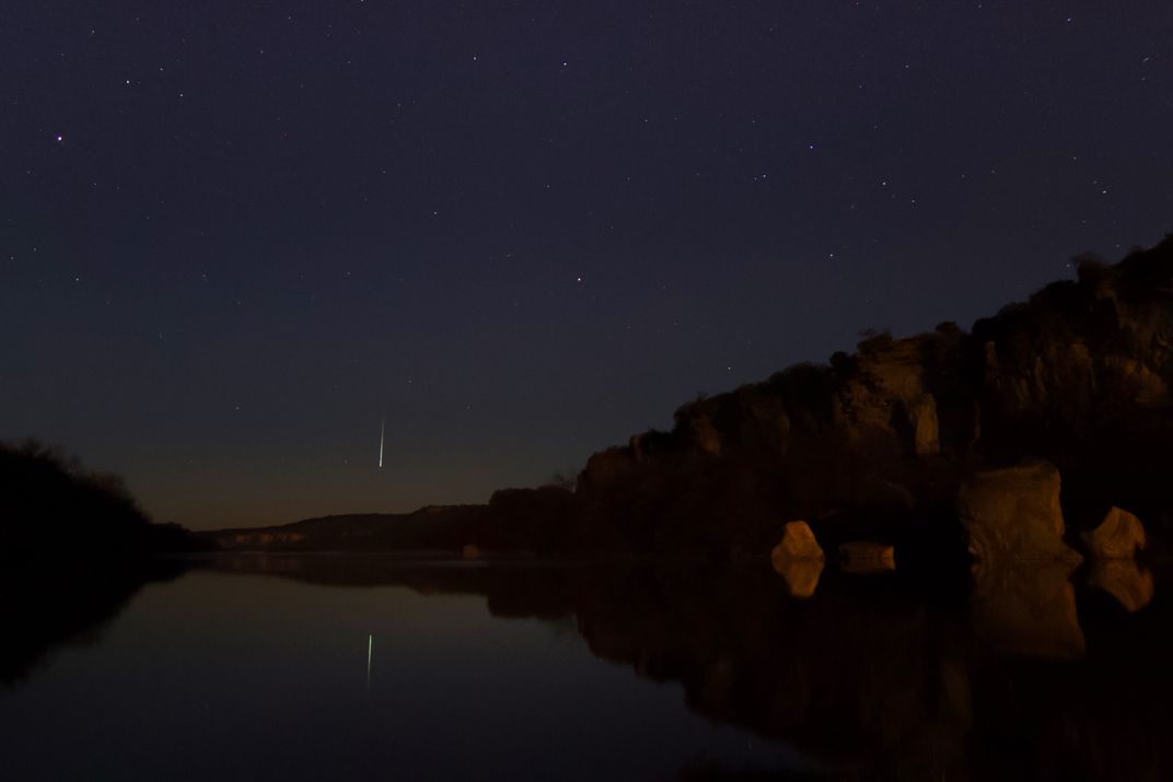 A Geminids meteor fireball over the Llano River in Mason, Texas ...