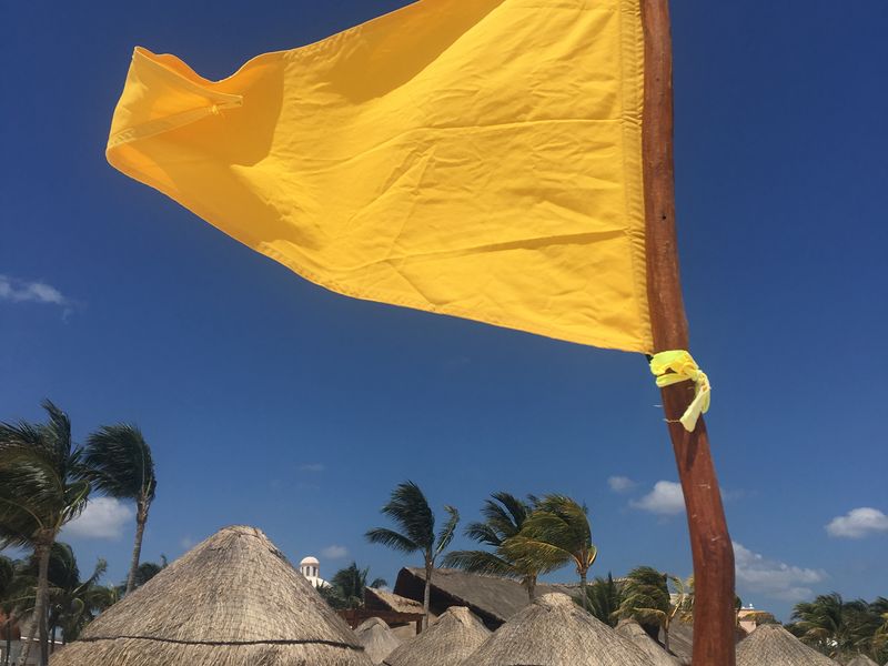 Caution flag in Riviera Maya. | Smithsonian Photo Contest | Smithsonian ...